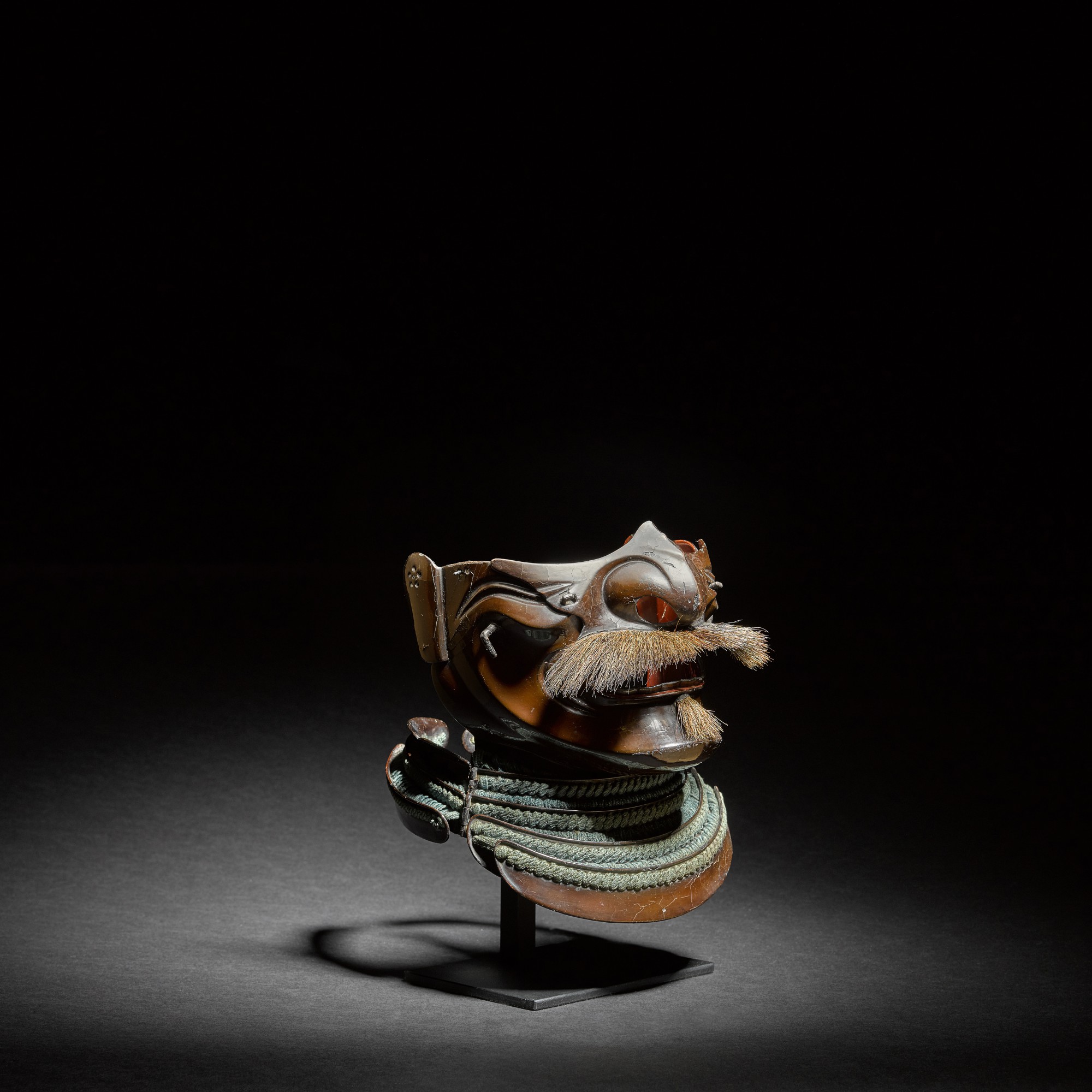 A rare toppai-nari kabuto [high-sided helmet] and mempo [face mask ...